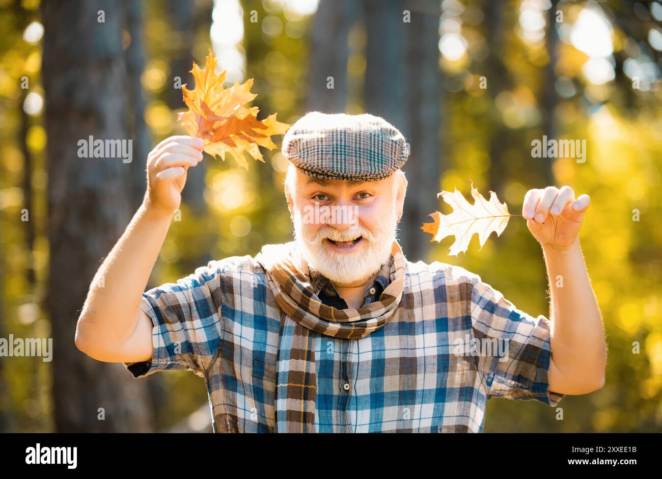 Freedom retirement concept. Senior citizen stroll in a park in autumn ...