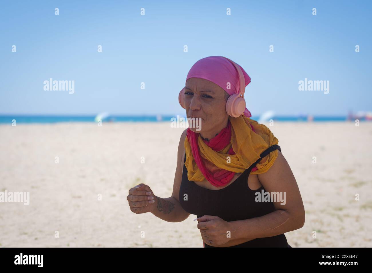 Middle-aged woman with cancer showing courage and strength during her ...