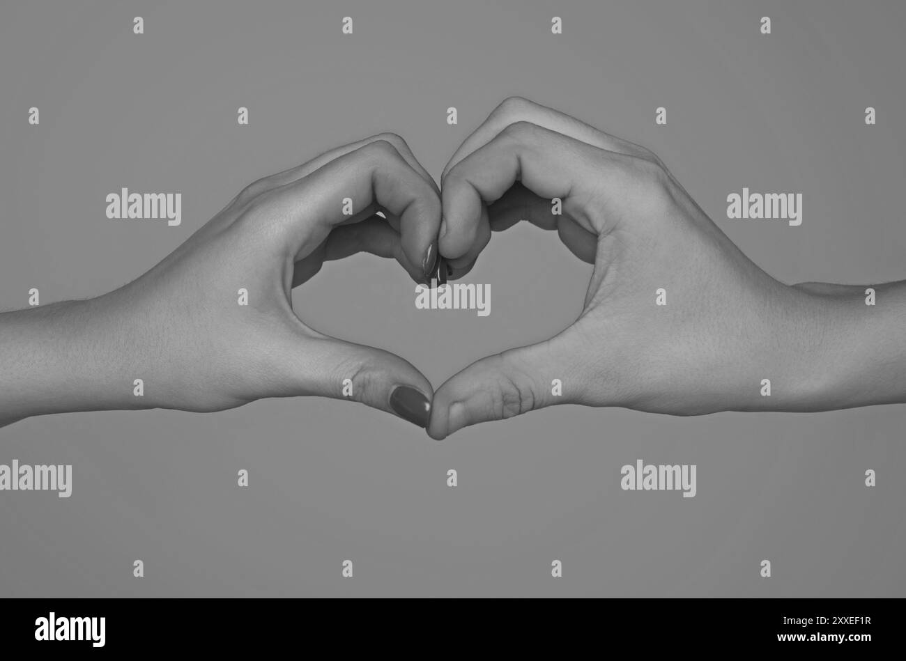 Female and male hands in form of heart. Hands in shape of love heart ...
