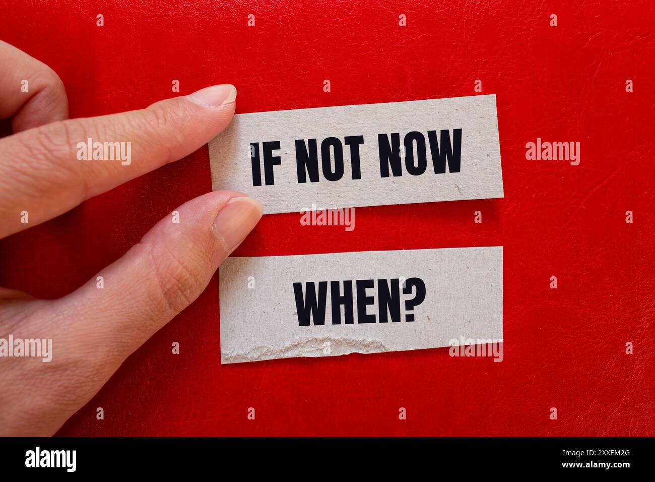 If not now, when question message written on paper pieces with red ...
