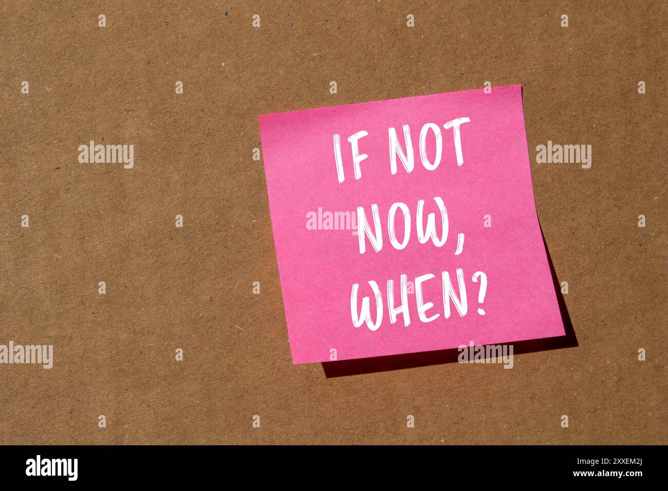 If not now, when question message written on pink paper with cardboard ...