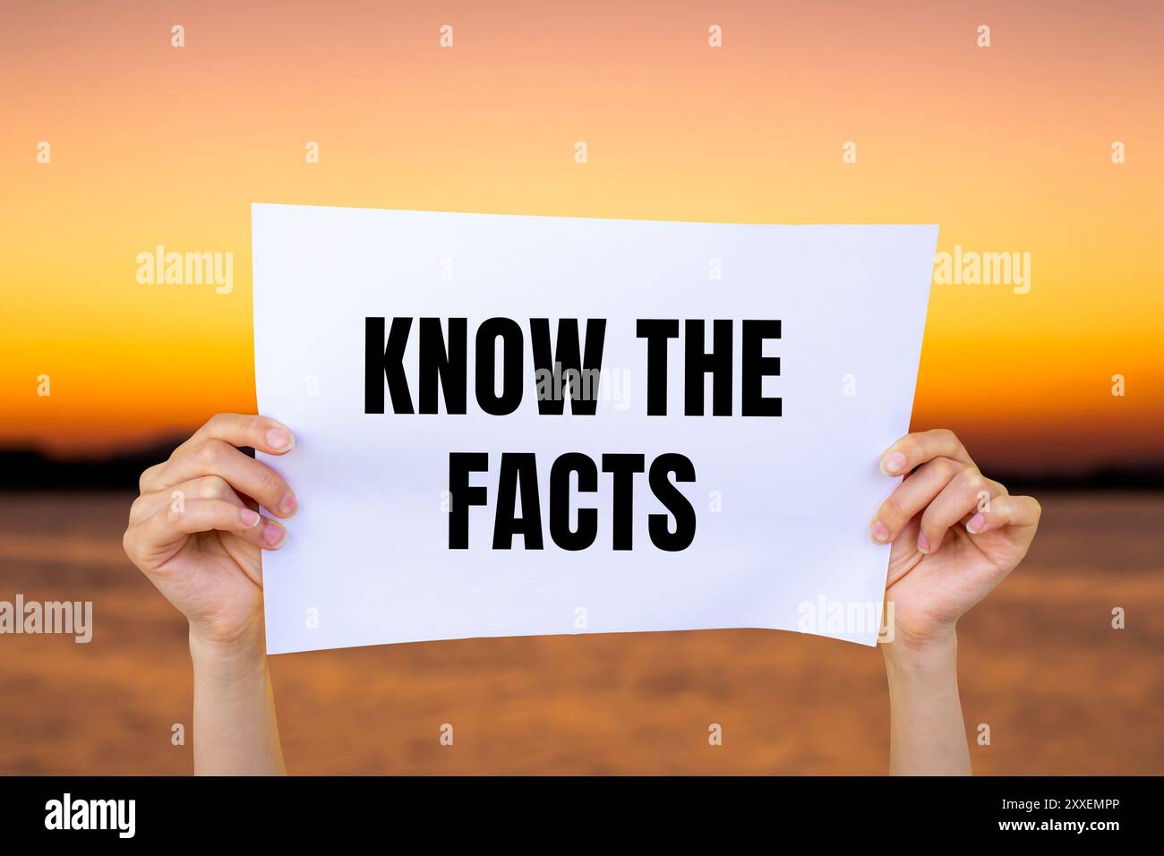 Know the facts message written on white paper with blurry lake ...