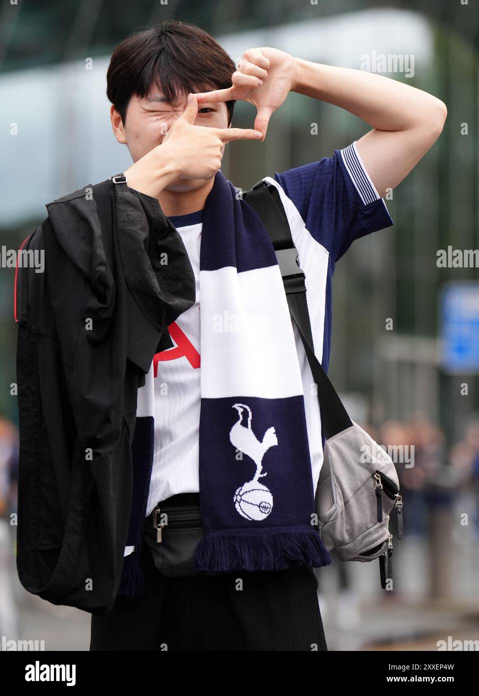 A Tottenham Hotspur fan before the Premier League match at the ...