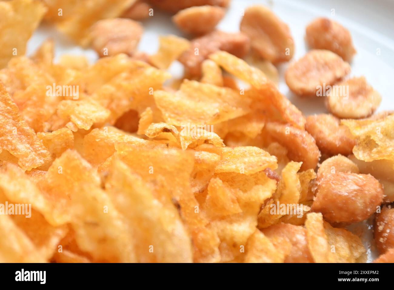 Potato chips peanuts snack hi-res stock photography and images - Alamy