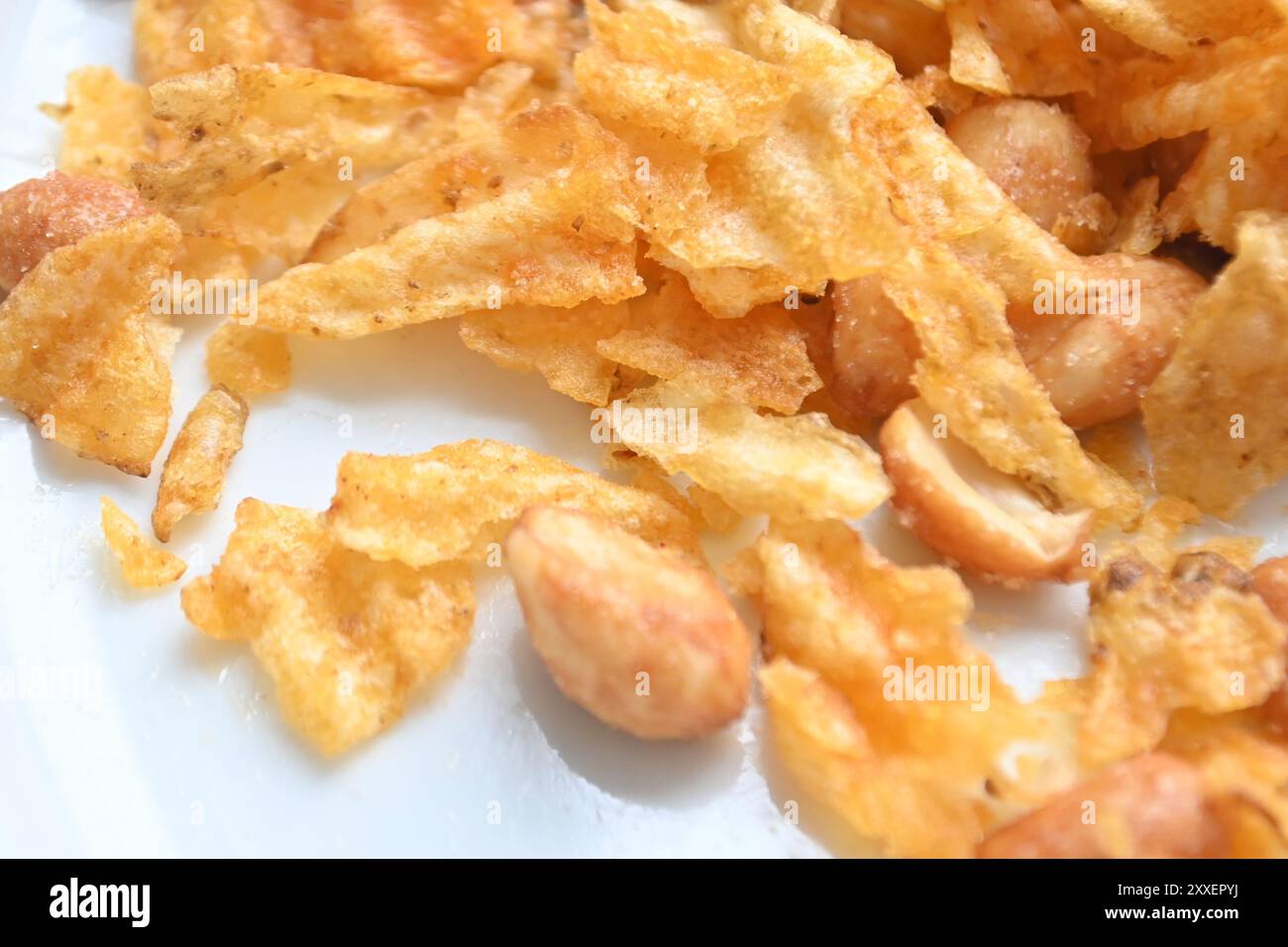 Potato chips peanuts snack hi-res stock photography and images - Alamy