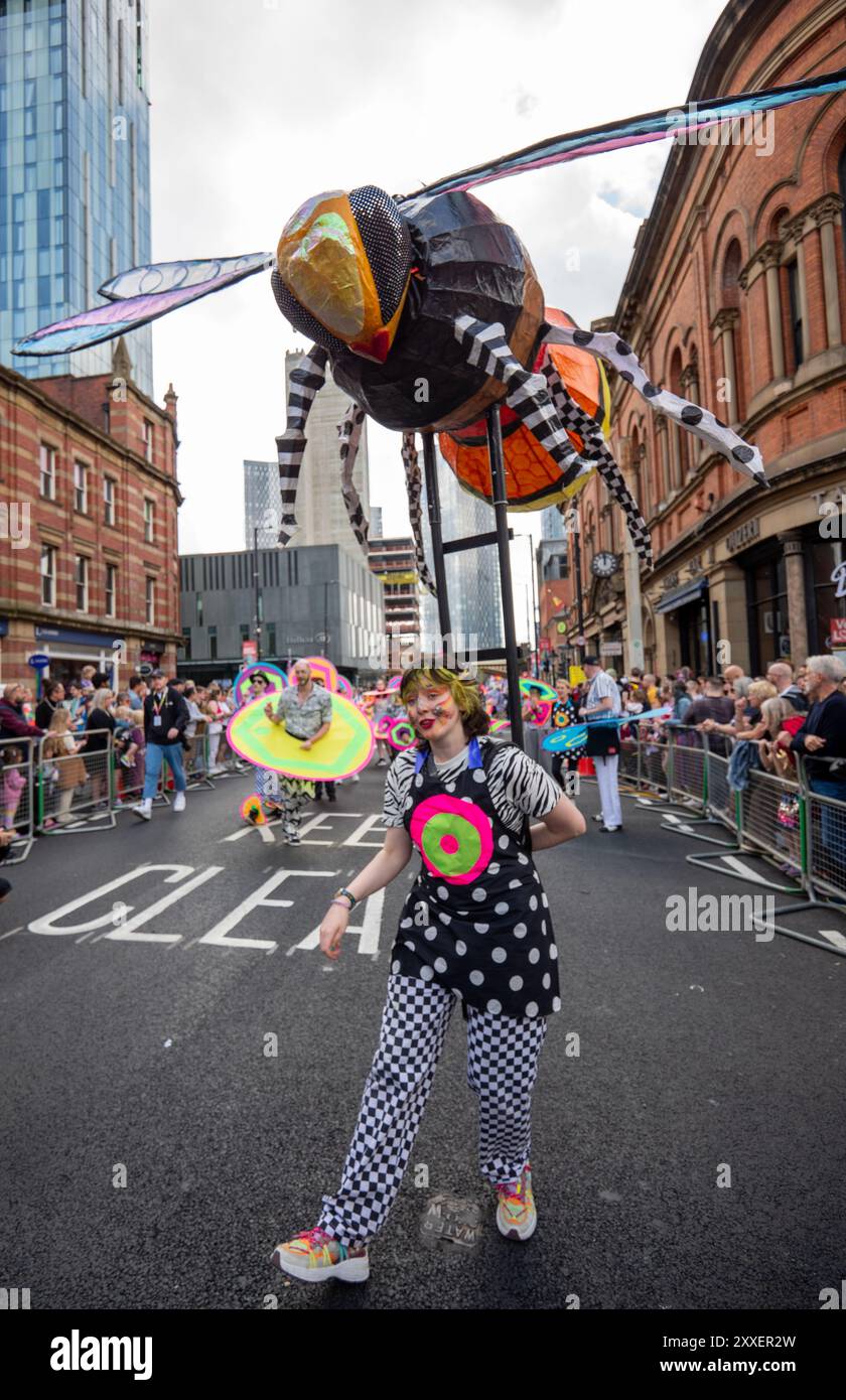 Manchester, UK. 24th Aug, 2024. Iconic Manchester Bee leads Parade ...