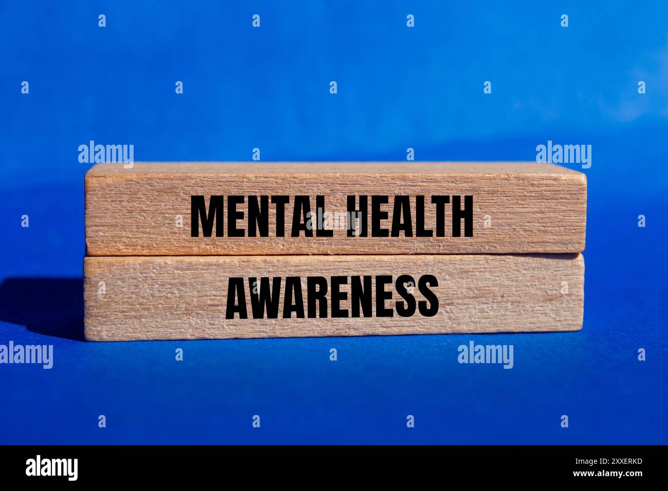 Mental health awareness message written on wooden blocks with blue ...