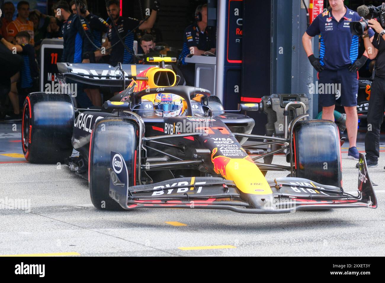 Red Bull driver Sergio Perez of Mexico steers his car out of garage during qualifying session ...