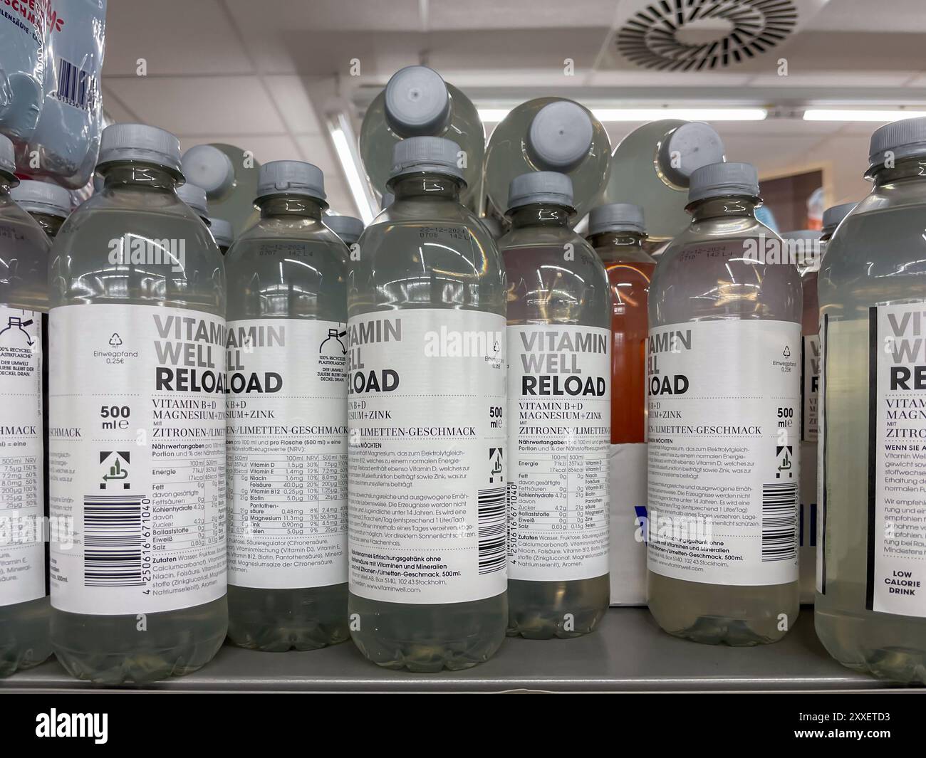 Germany Berlin August 17, 2024. Bottles of vitamin water are lined up ...