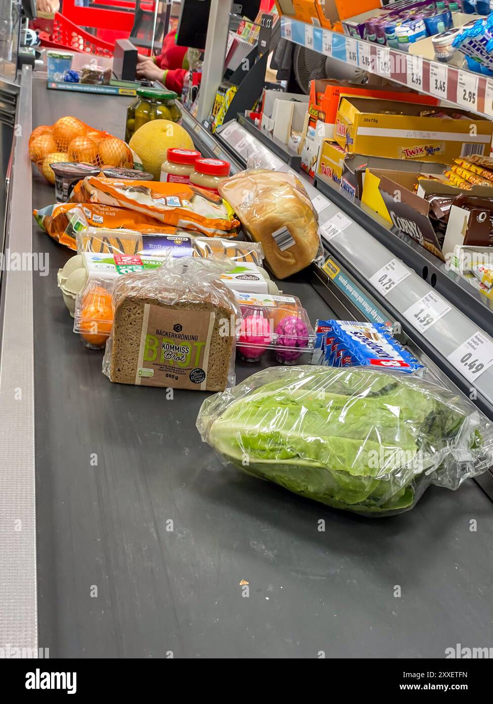 Germany Berlin August 17, 2024. A grocery store with a conveyor belt ...