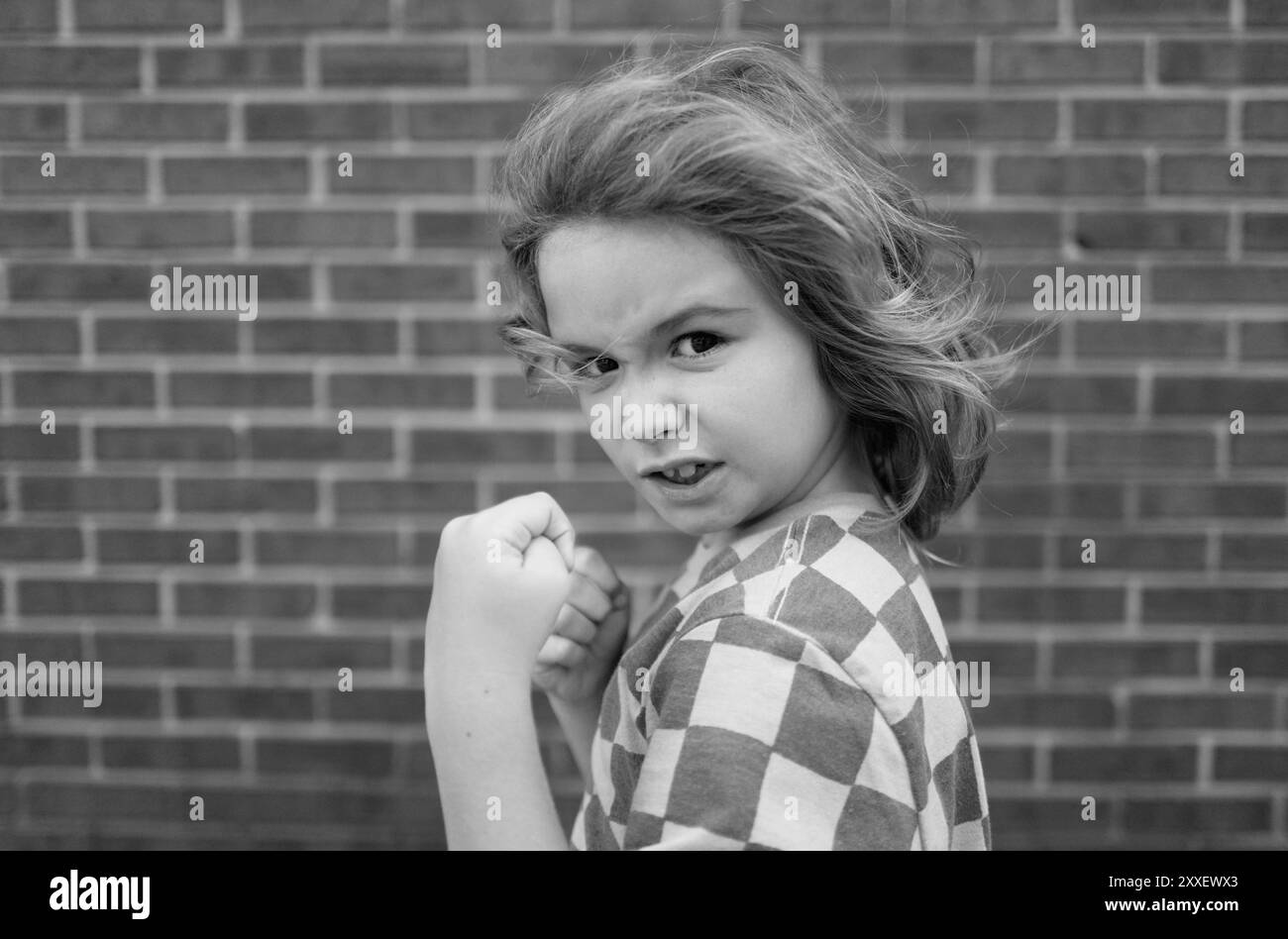 Child temper with angry expression. Angry hateful little anger boy ...