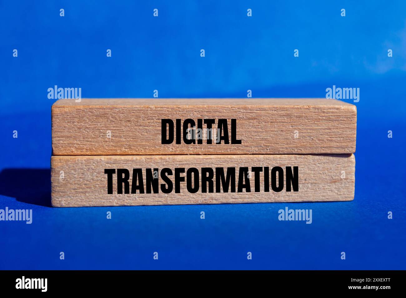 Digital transformation message written on wooden blocks with blue ...
