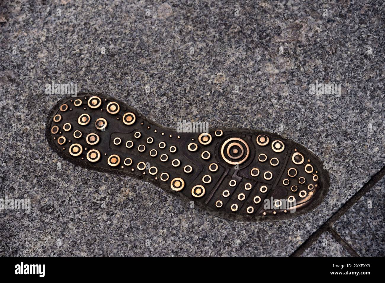 Brass footprints on pavement Dublin Stock Photo - Alamy