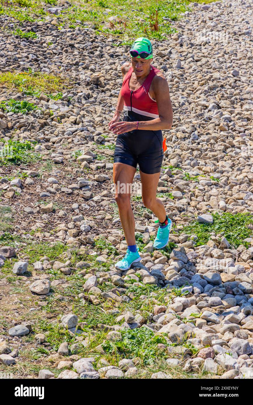 Participants taking part in Clevedons swim run Stock Photo - Alamy