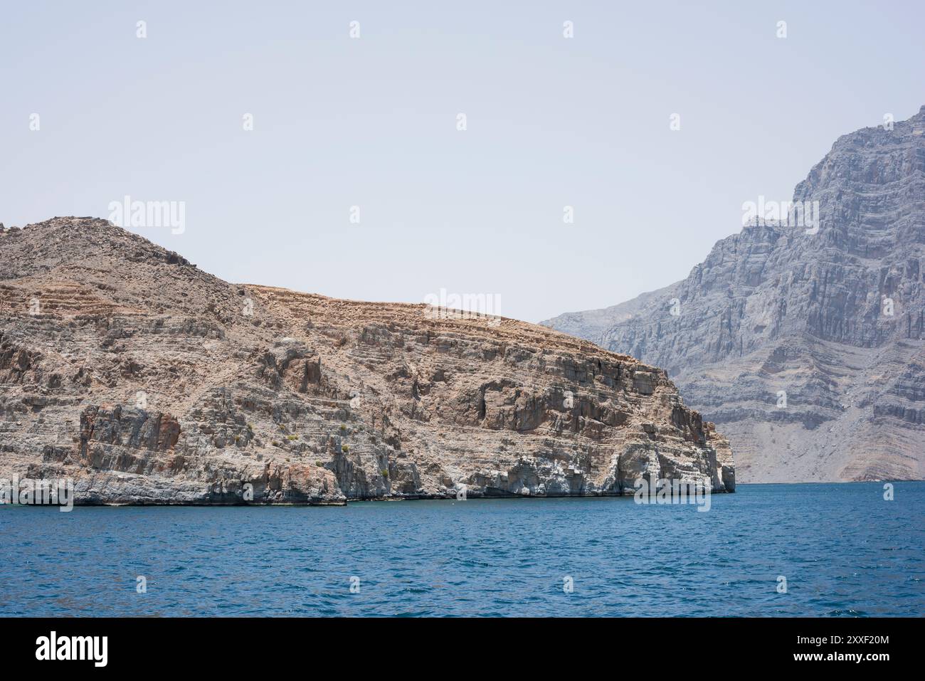 Cliffs and sea in the wild fjord-like of Musandam peninsula, Sultanate ...