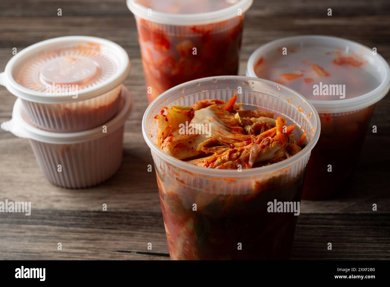 A view of several containers of kimchi Stock Photo - Alamy