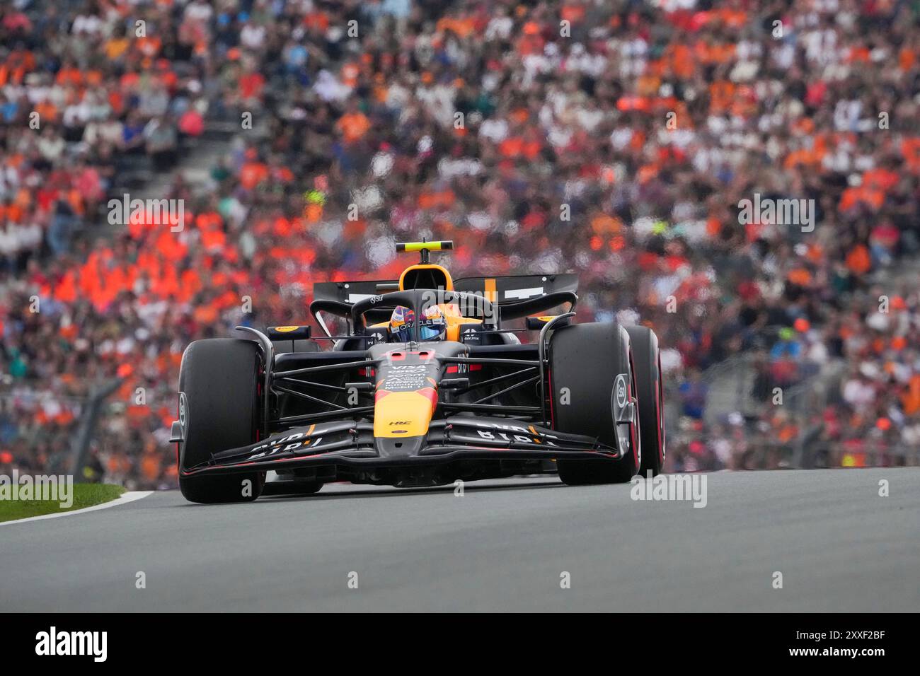 Red Bull driver Sergio Perez of Mexico steers his car during qualifying session ahead of the ...
