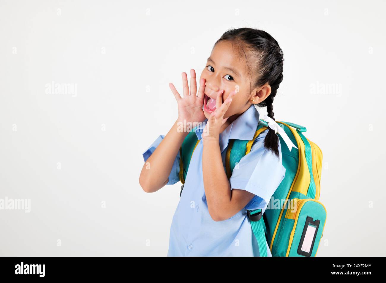 Portrait smile Asian little girl kindergarten hold hands open mouth ...