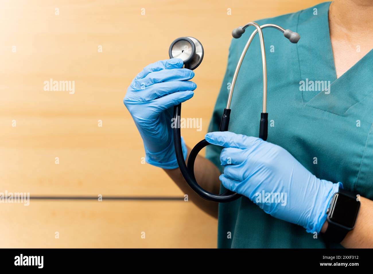 closeup of a doctor showing the stethoscope in his hands as a health ...