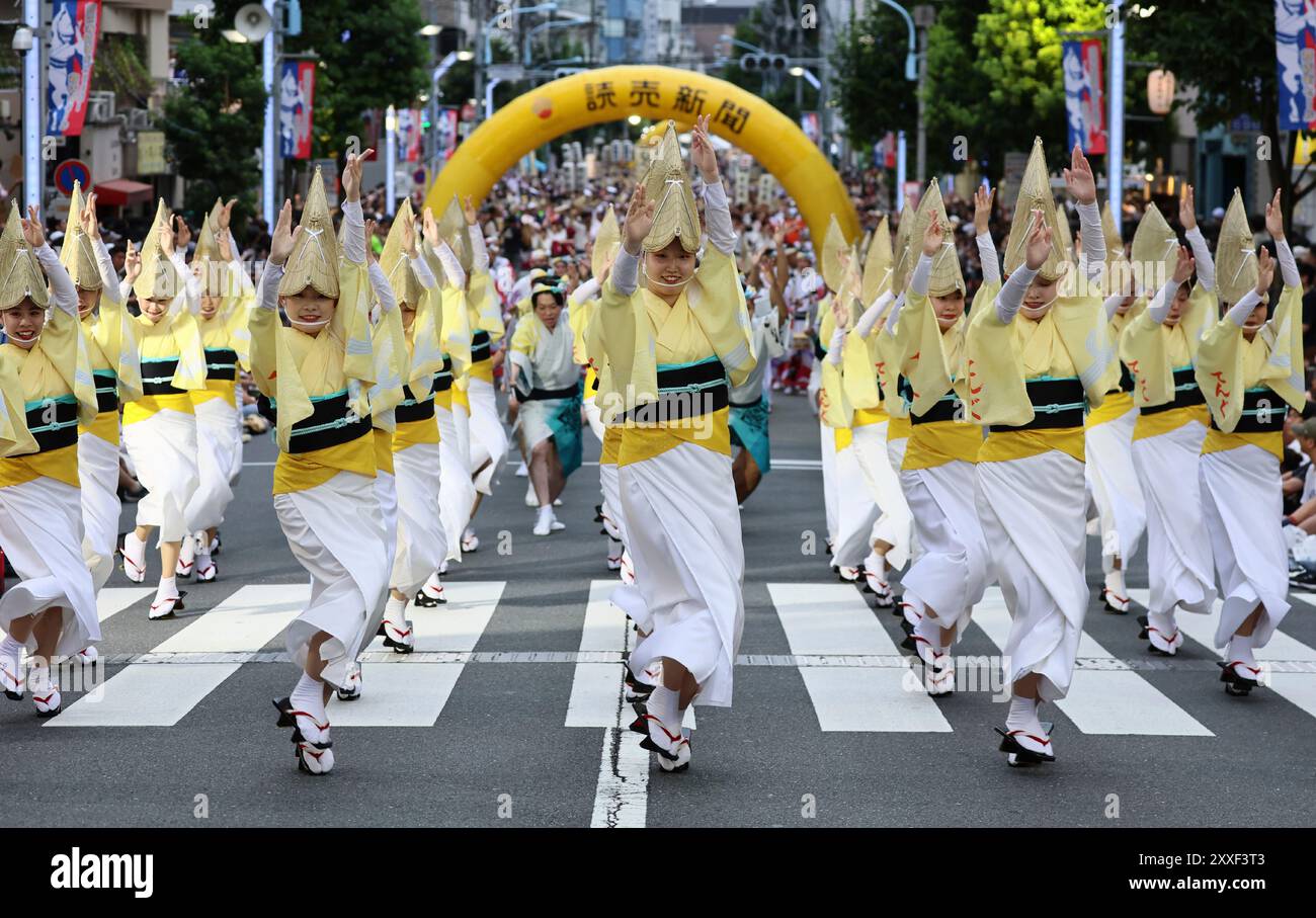 Dancers move to traditional Japanese "hayashi" music during a dance ...