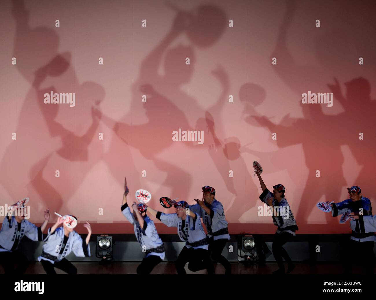Dancers move to traditional Japanese "hayashi" music during a dance ...