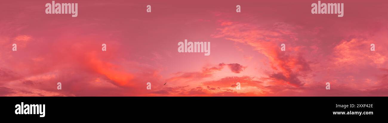 Sunset sky panorama with bright glowing pink Cumulus clouds. HDR 360 ...