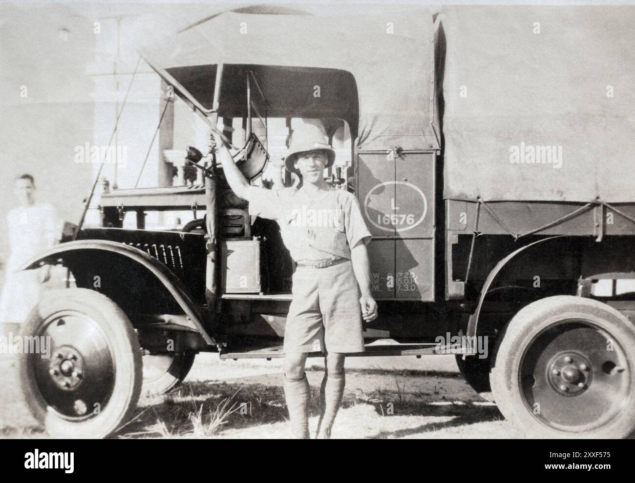 A British soldier alongside an army truck, c. 18910s-1920s Stock Photo ...