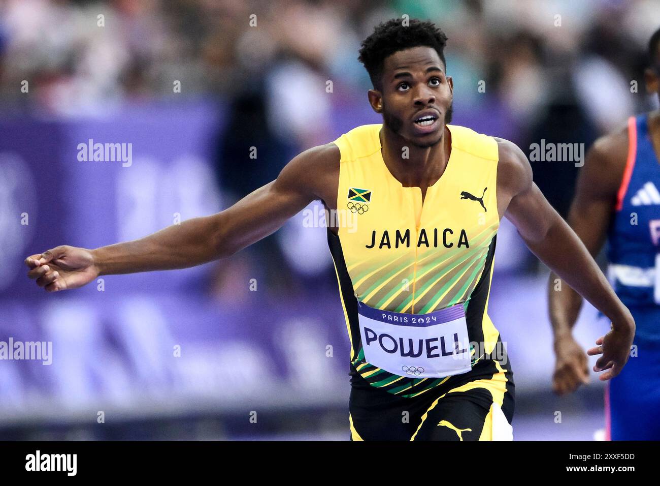 Jevaughn Powell of Jamaica competes in the 400m men first round during ...