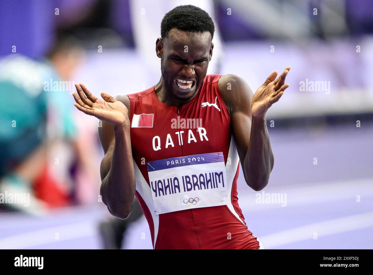 Ammar Ismail Ibrahim Yahia of Qatar reacts after competing in the 400m men first round during ...