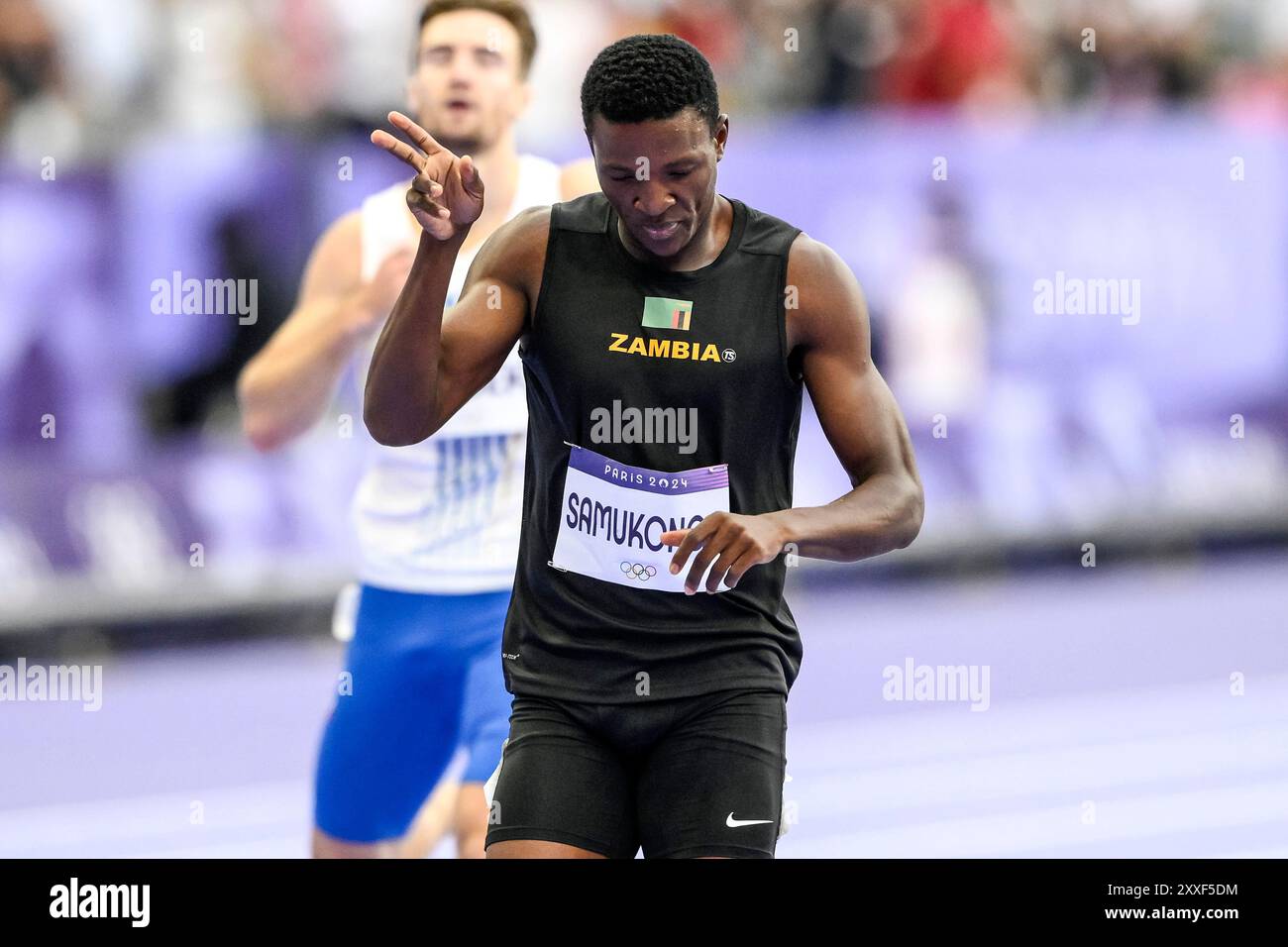 Muzala Samukonga of Zambia reacts after competing in the 400m men first ...