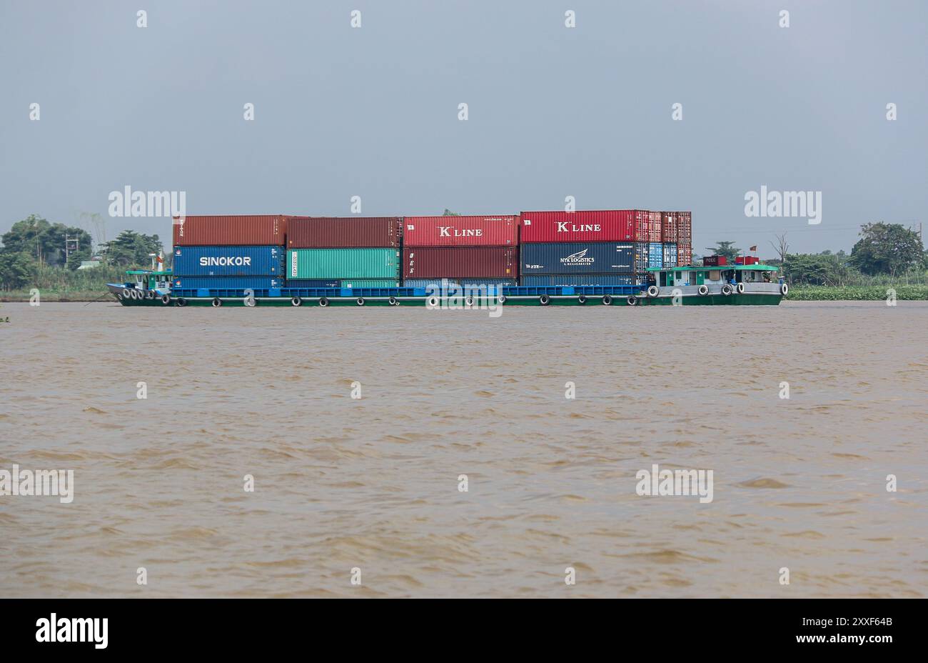 Mekong River, Vietnam/Cambodia. Aug 24,2024: Vietnamese container ship ...