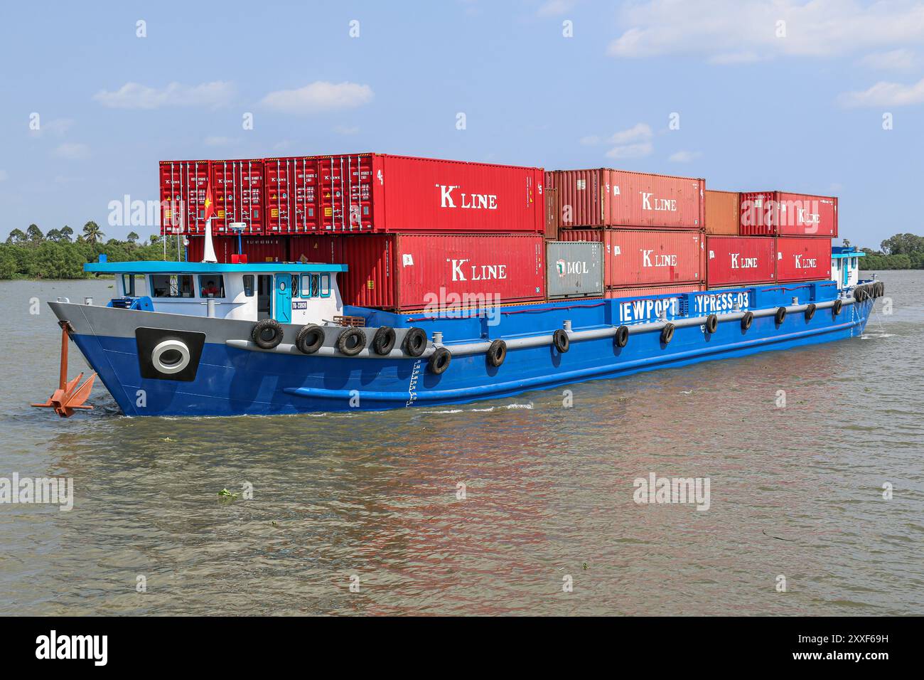 Mekong River, Vietnam/Cambodia. Aug 24,2024: Vietnamese container ship ...