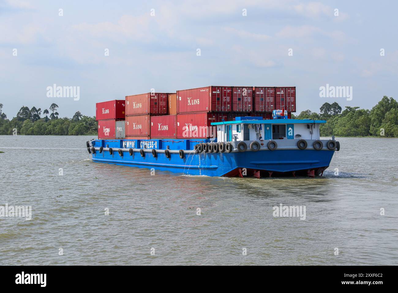 Mekong River, Vietnam/Cambodia. Aug 24,2024: Vietnamese container ship ...