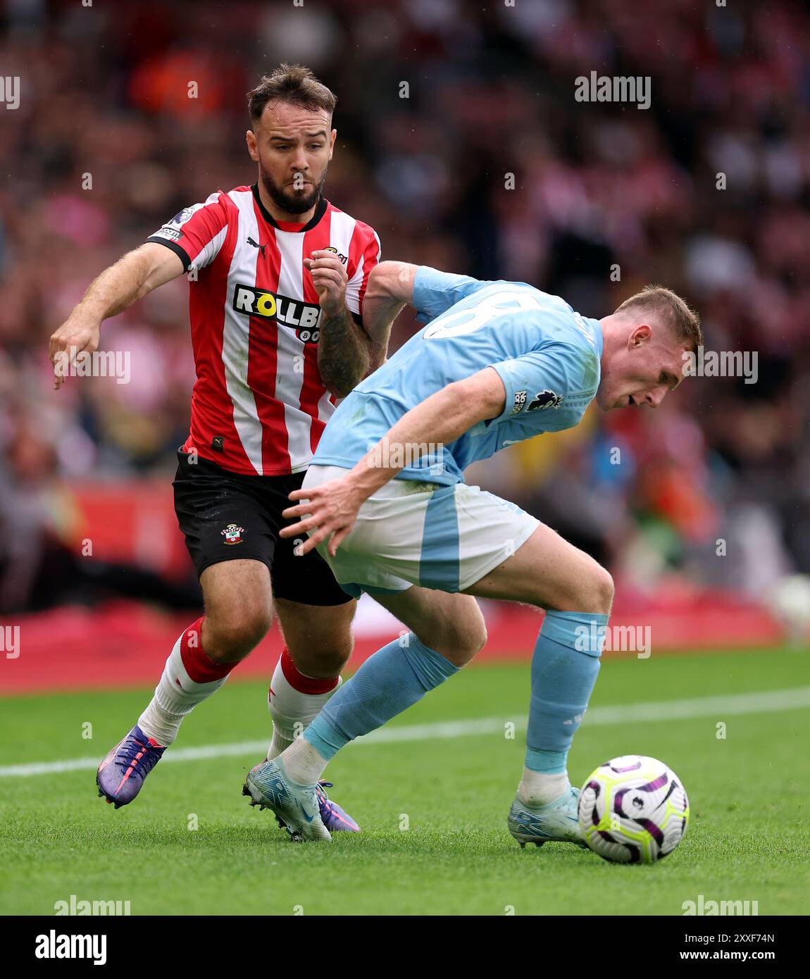 Southampton's Adam Armstrong and Nottingham Forest's Elliot Anderson ...