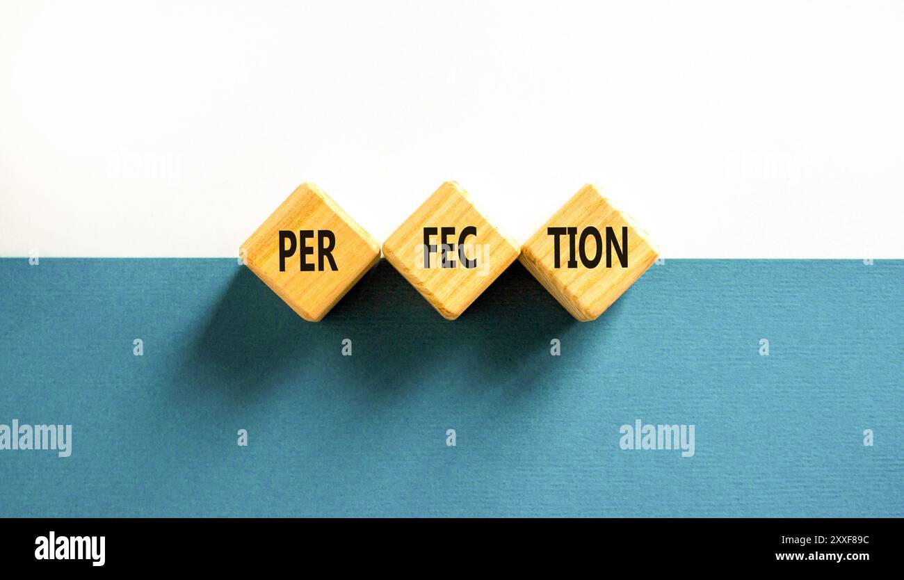Perfection symbol. Concept word Perfection on beautiful wooden blocks ...