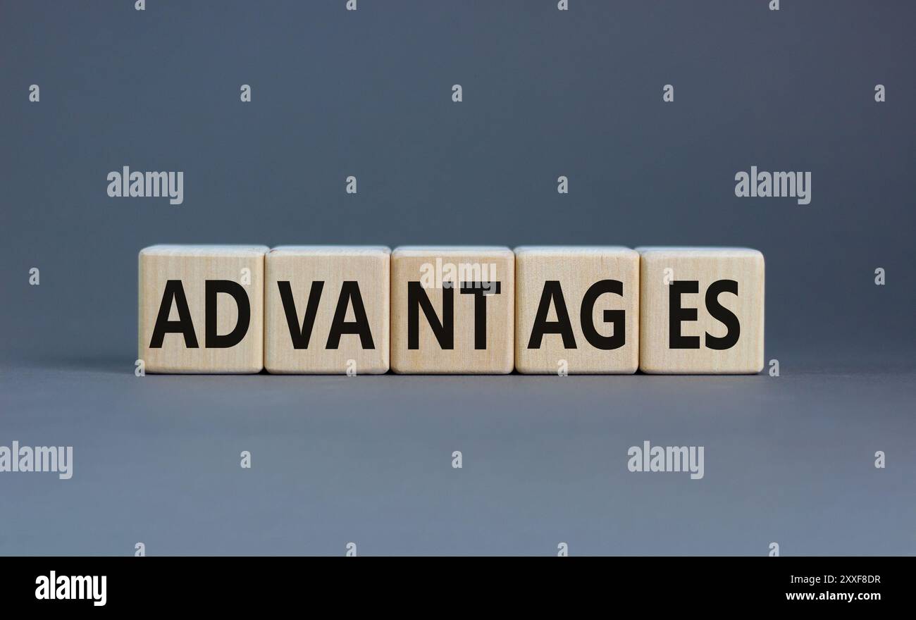 Advantages symbol. Concept word Advantages on beautiful wooden blocks ...