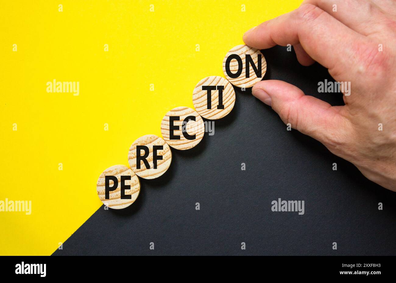 Perfection symbol. Concept word Perfection on beautiful wooden circles ...