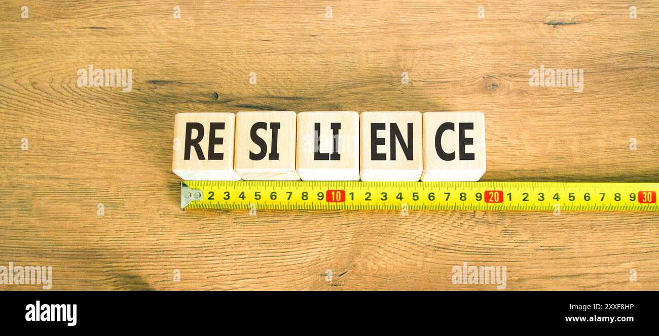 Resilience symbol. Concept word Resilience on beautiful wooden cubes ...