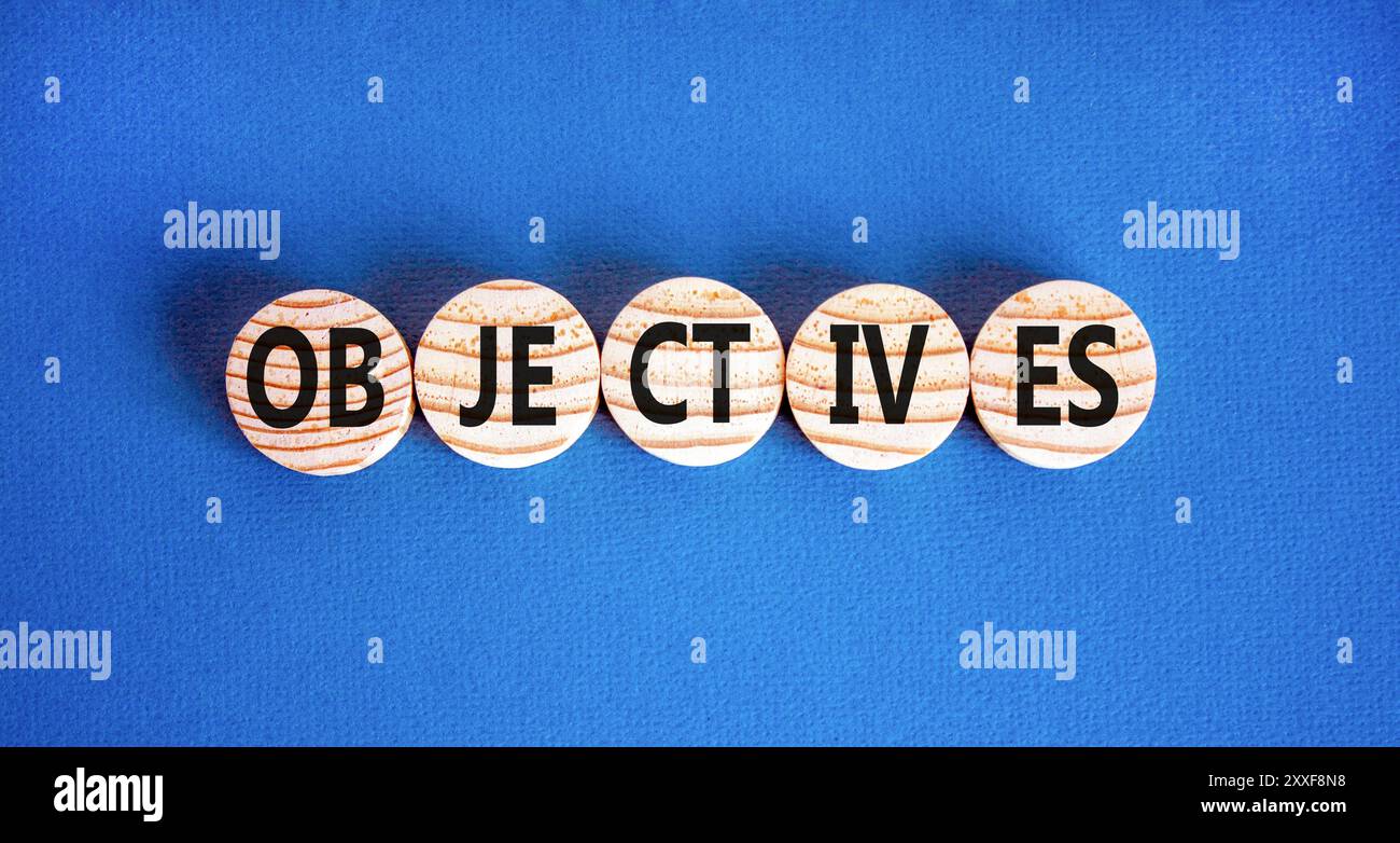 Objectives symbol. Concept word Objectives on beautiful wooden circles ...