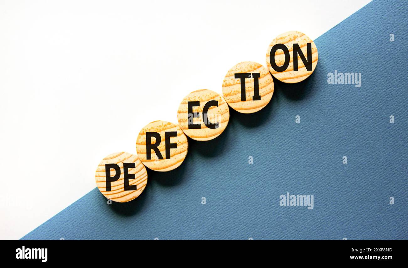 Perfection symbol. Concept word Perfection on beautiful wooden circles ...