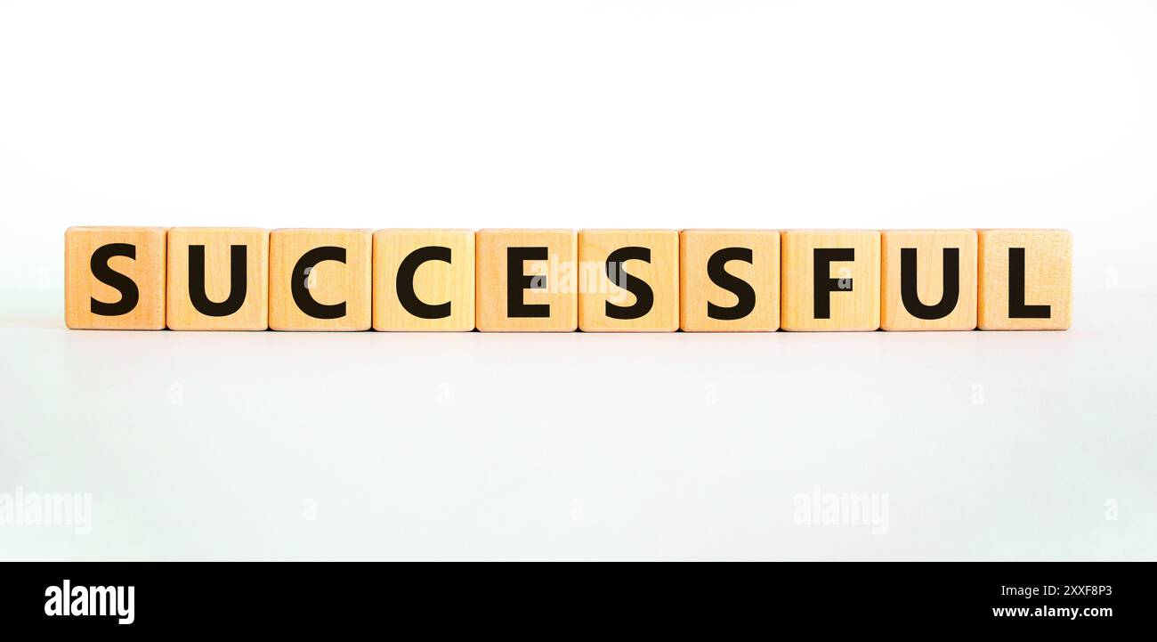 Successful symbol. Concept word Successful on beautiful wooden blocks ...