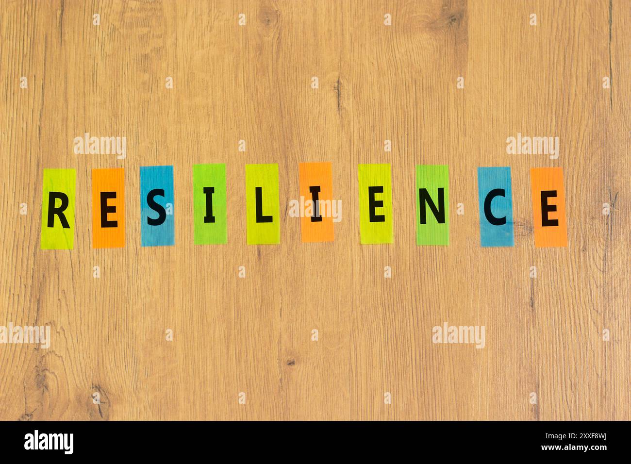 Resilience symbol. Concept word Resilience on beautiful colored paper ...