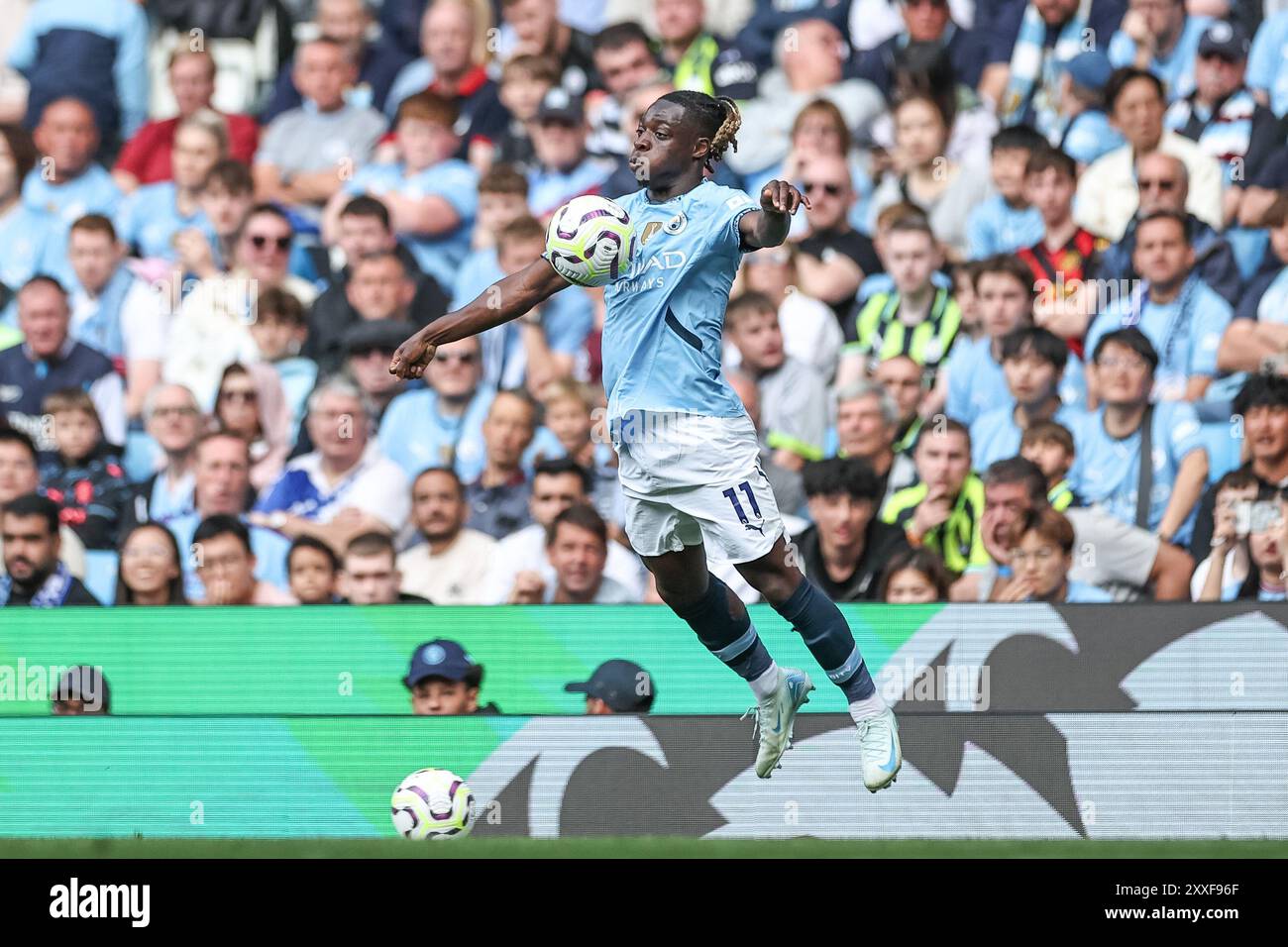 Jérémy Doku of Manchester City controls the ball during the Premier ...