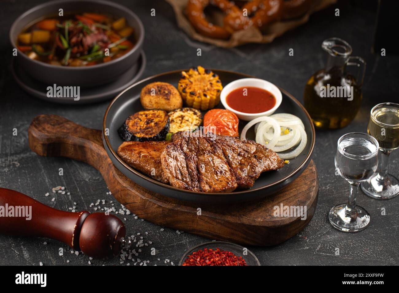Portion of german grilled pork meat Stock Photo - Alamy