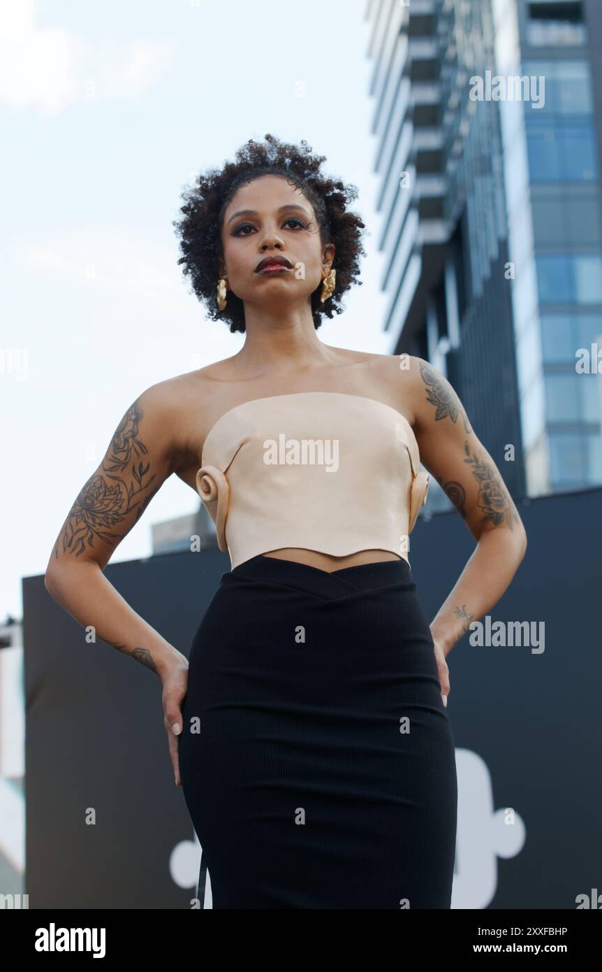 A model poses on the runaway at the Hannah Silver-King fashion show in ...