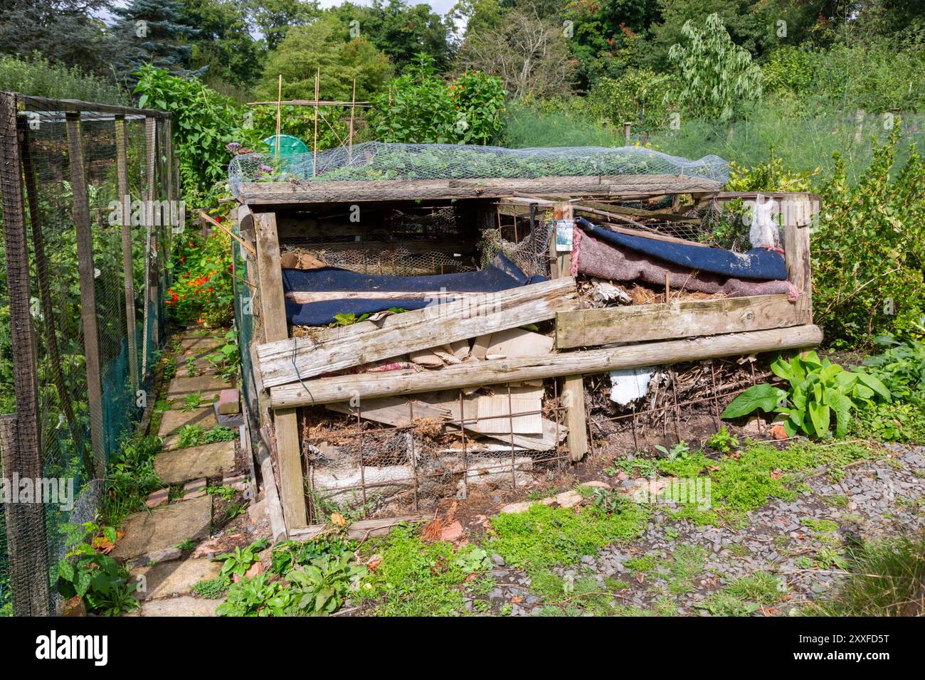 Wooden composting frames in a garden, UK. 2024 Stock Photo - Alamy