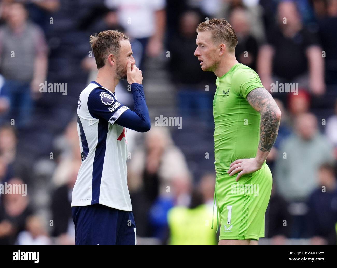 Tottenham Hotspur's James Maddison and Everton's Jordan Pickford after ...