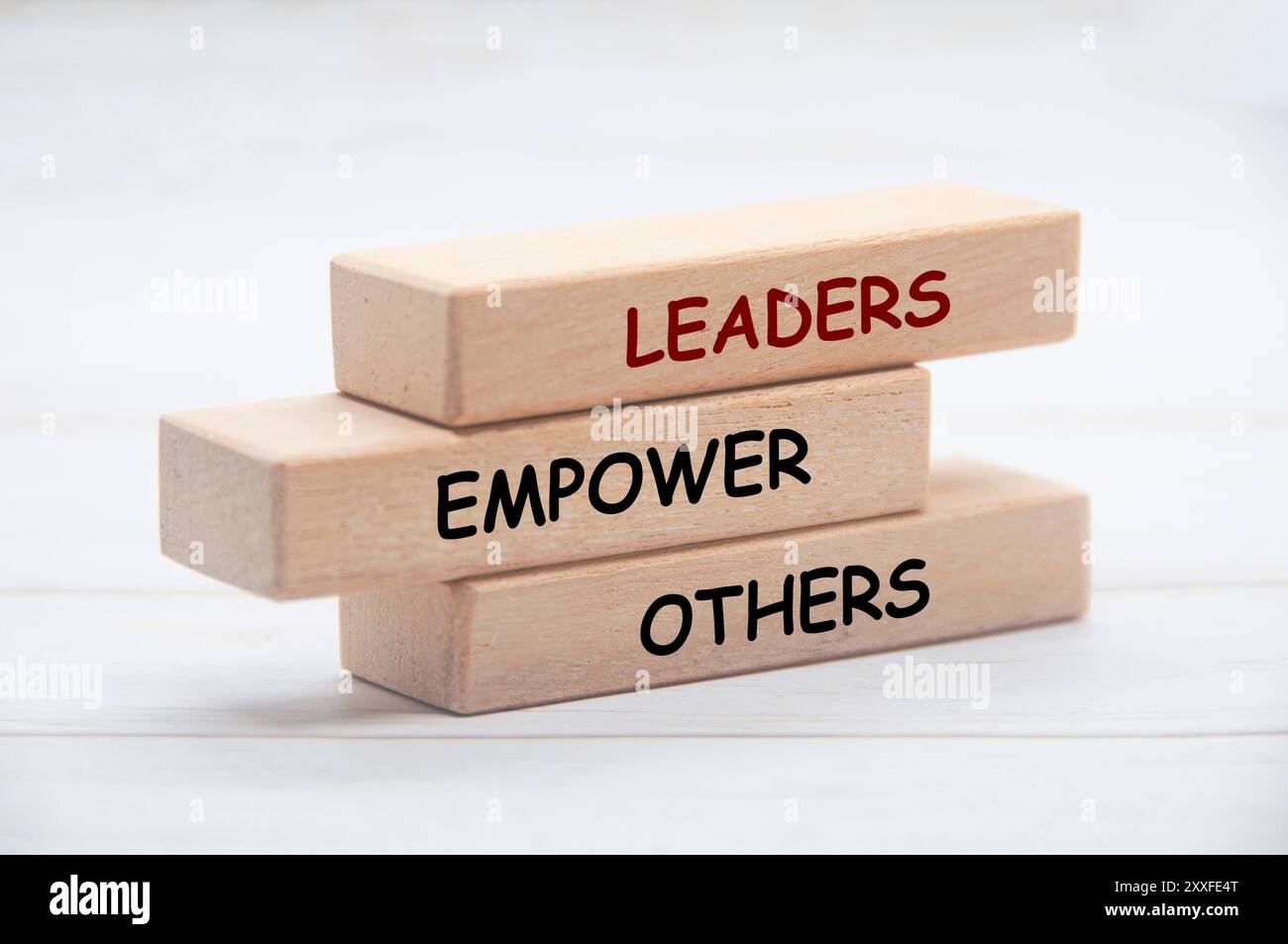 Leaders empower others text on wooden blocks. Leaderships concept Stock ...