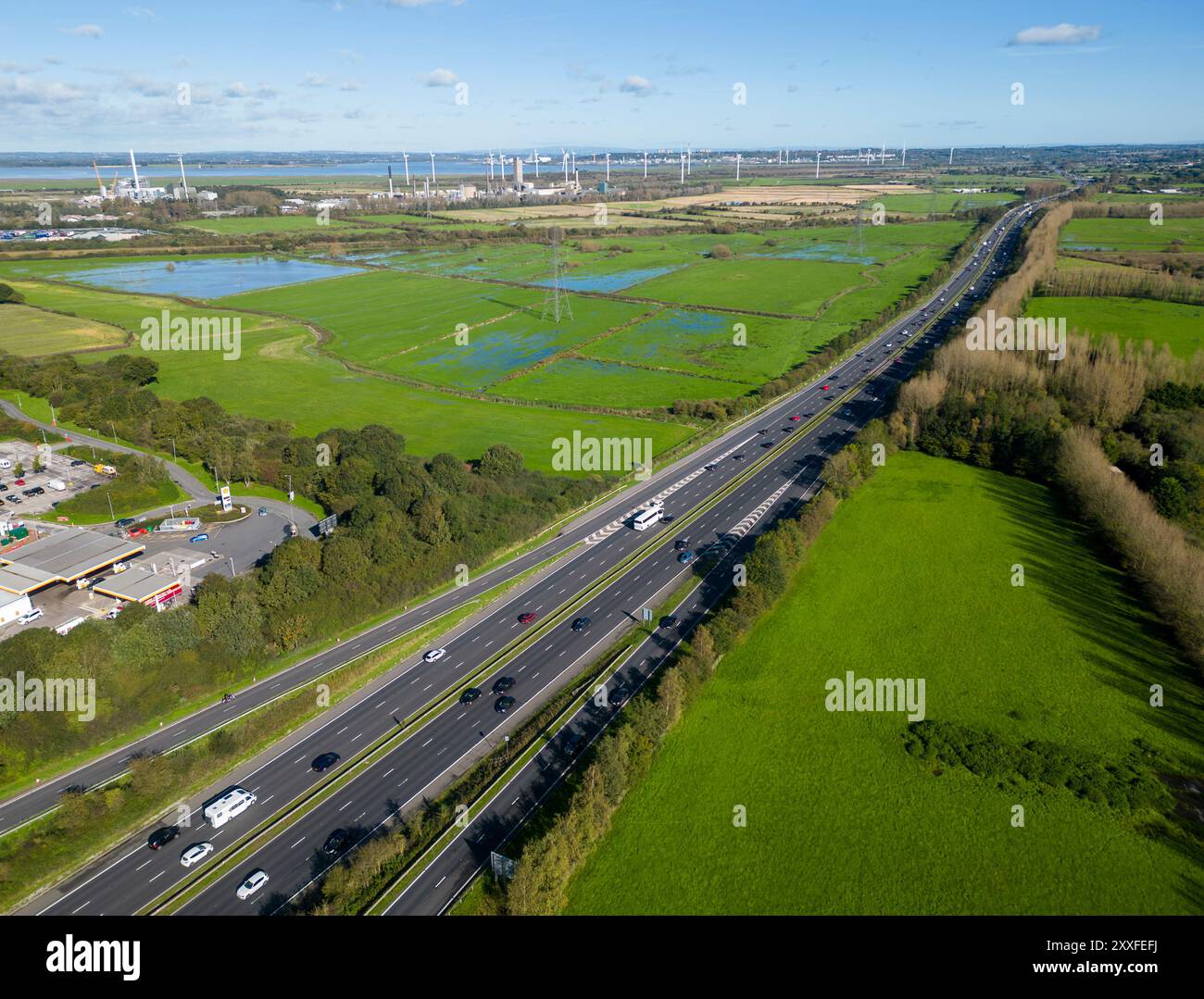 M56 Motorway and Frodsham wind Farm, Helsby village, Cheshire, England ...