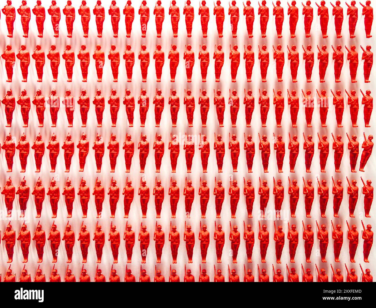 graphic abstract multiple red plastic soldiers mounted on wall red army ...